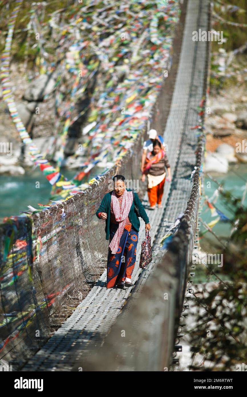 Prayer flags at the suspension bridge over the Seti River, Pokhara ...