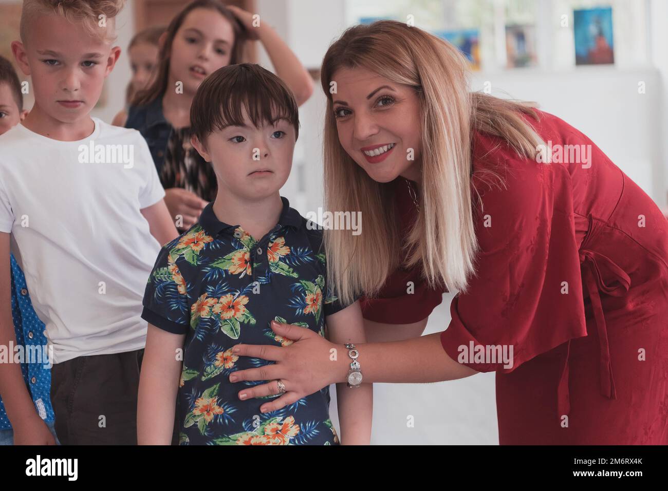 Preschool children wait in line for new and interesting games ...