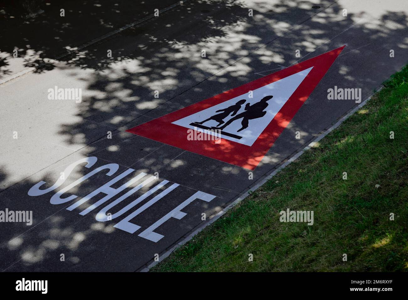 Ground marking Attention school Stock Photo - Alamy