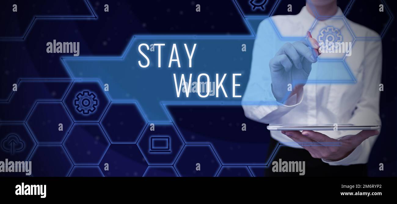 Hand writing sign Stay Woke. Business overview being aware of your ...