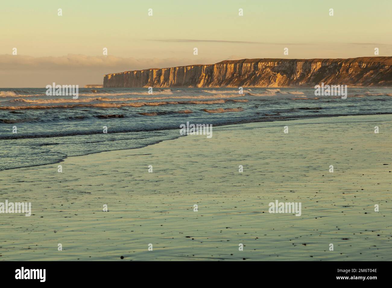 Sun sets on the towering cliffs of Flamborough Head, viewed from ...