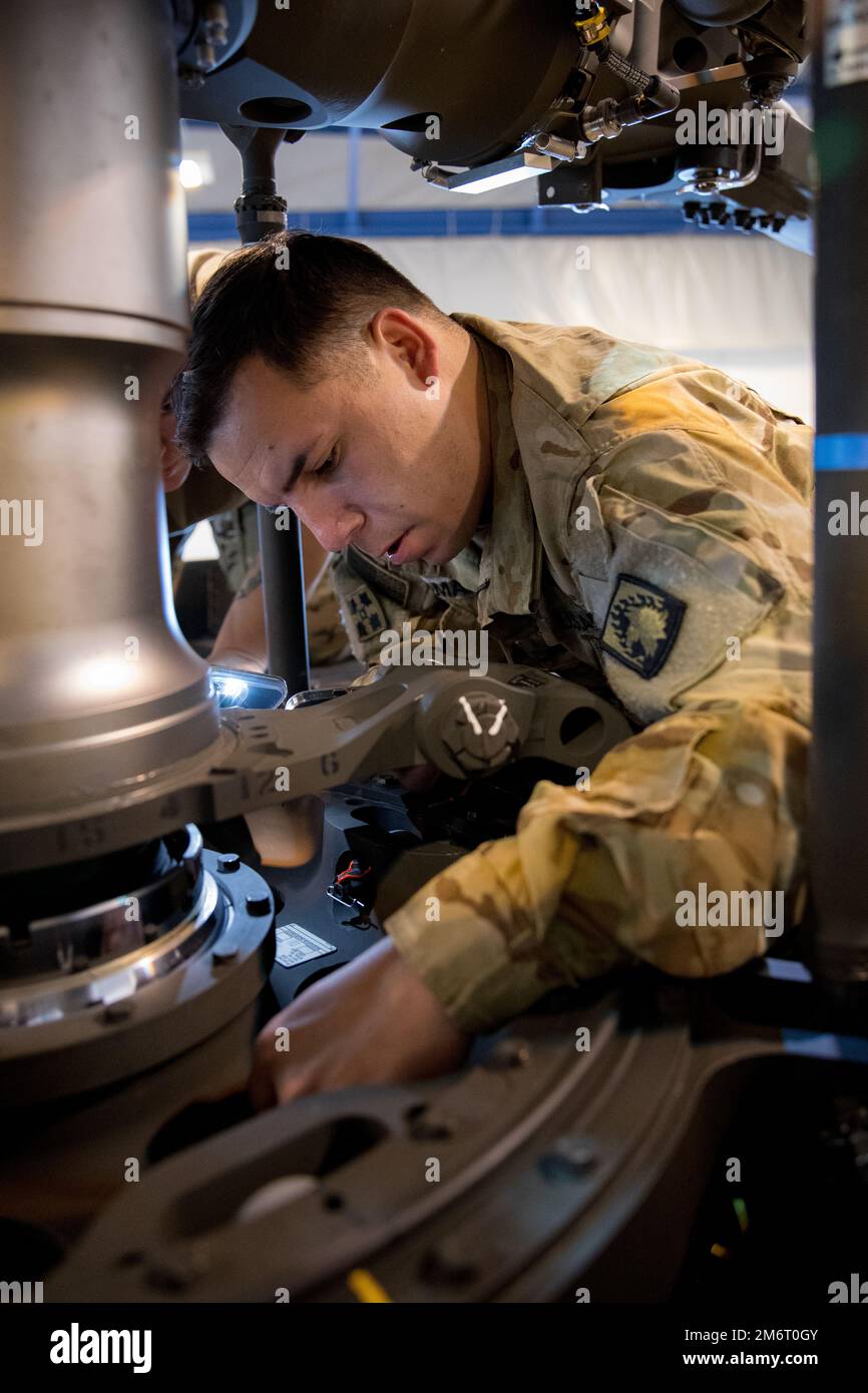 Sgt. Juan Roman, an avionics mechanic with Charlie Company, 1-214th ...