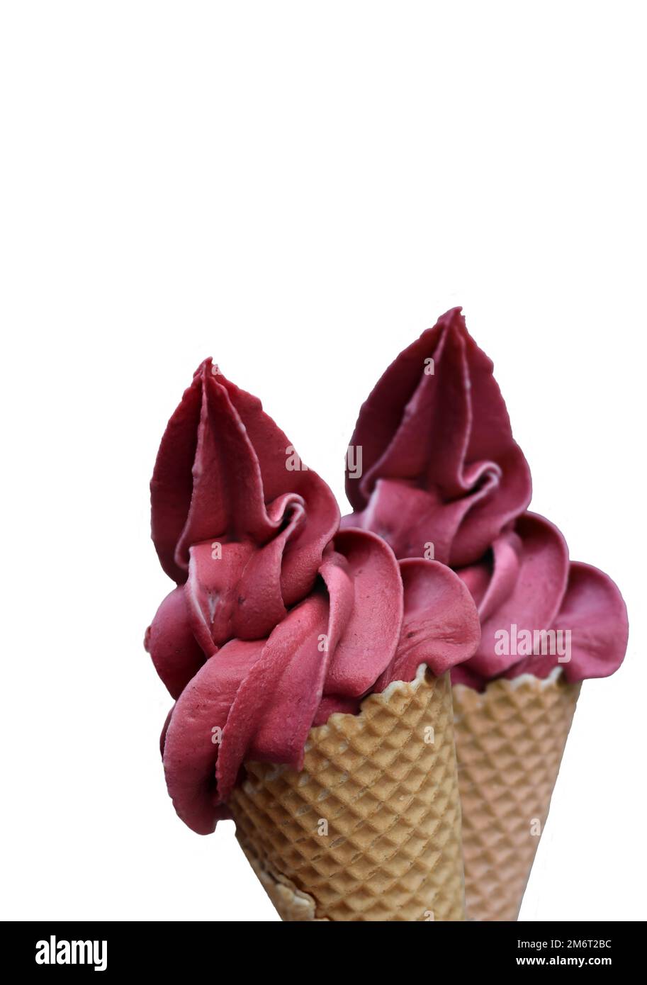 A waffle ice cream cone filled with a delicious freshly made raspberry ...