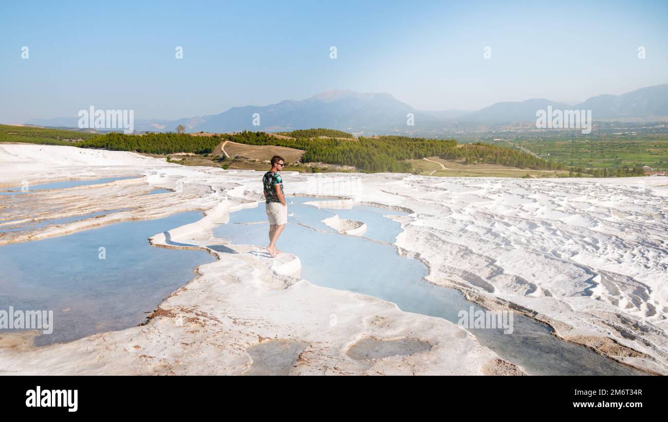 Natural travertine pools and terraces in Pamukkale. Cotton castle in ...