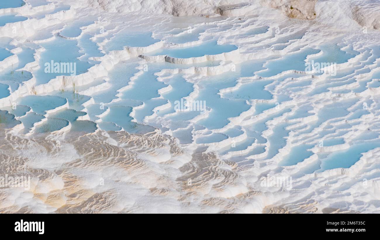 Natural travertine pools and terraces in Pamukkale. Cotton castle in ...