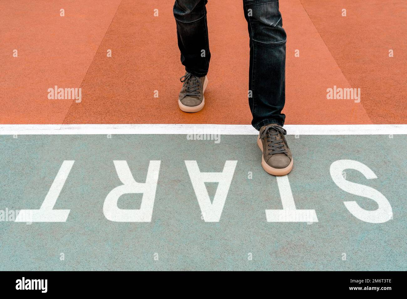 Walking across the start line Stock Photo - Alamy