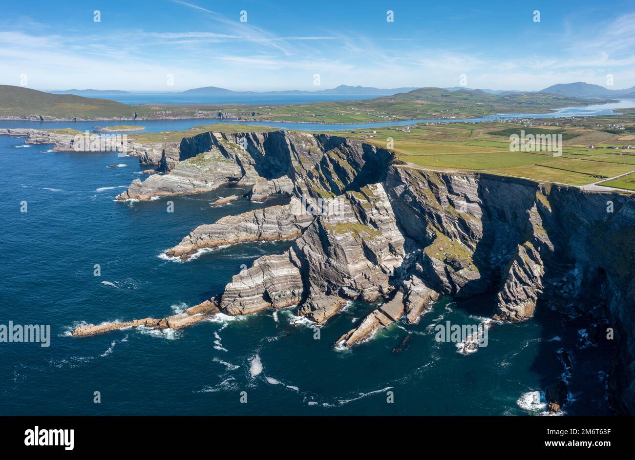 Panorama landscape view of the Kerry Cliffs and Iveragh Peninsula in ...