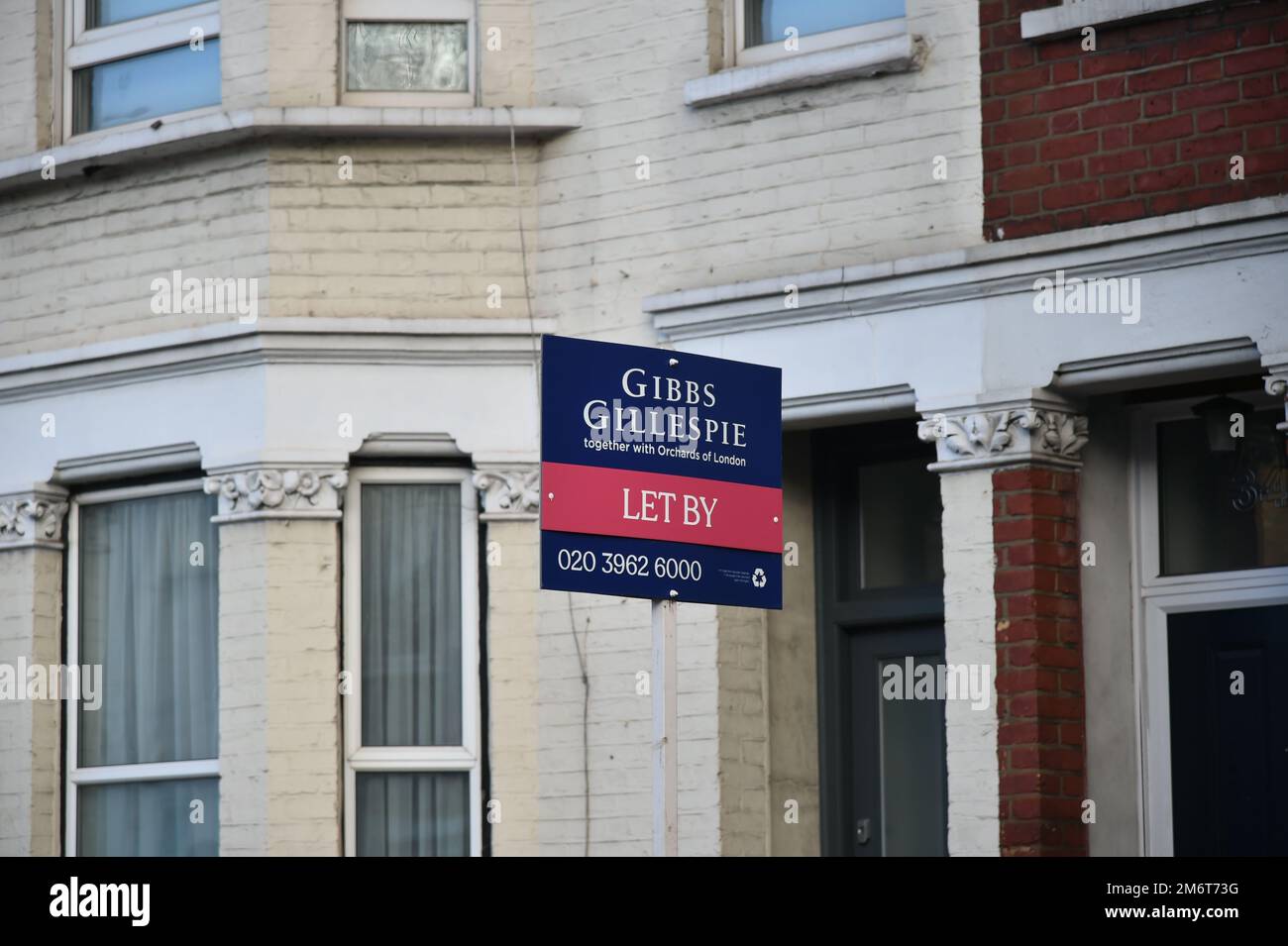 Estate Agent signs on residential houses Stock Photo - Alamy
