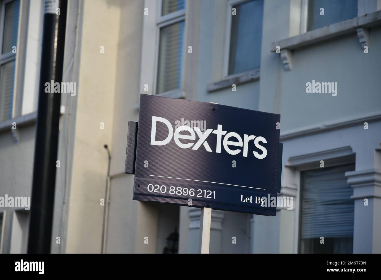 Estate Agent signs on residential houses Stock Photo - Alamy