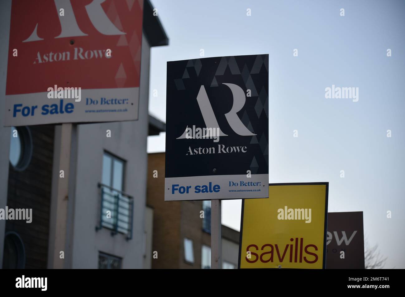 Estate Agent signs on residential houses Stock Photo - Alamy