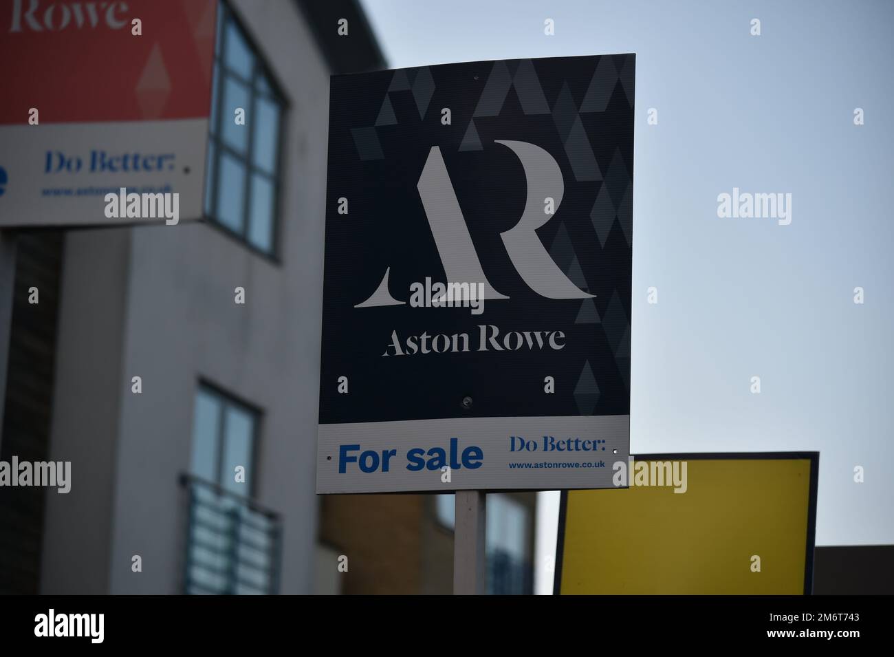Estate Agent signs on residential houses Stock Photo - Alamy