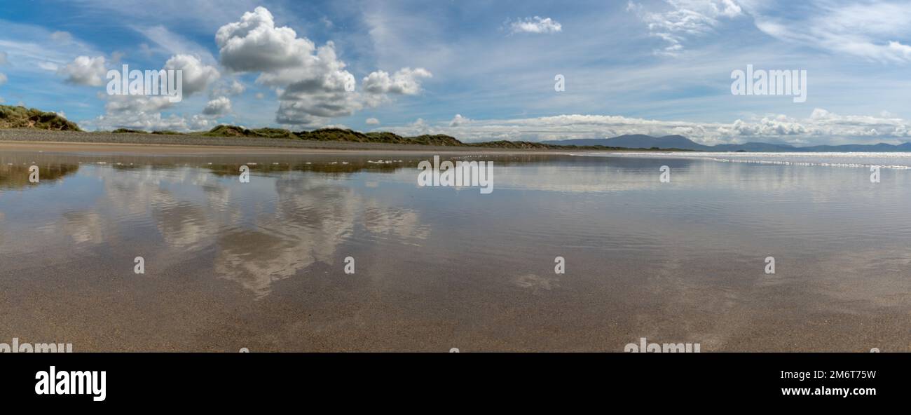 Peaceful panorama landscape of an empty golden sand beach with ...
