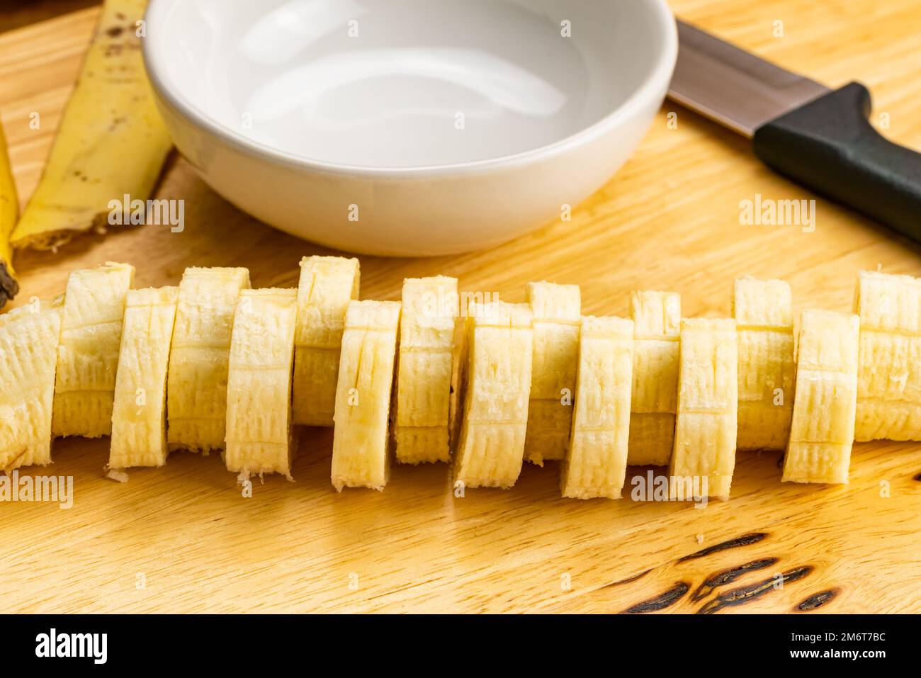 Cutting peeled banana kitchen hi-res stock photography and images - Alamy