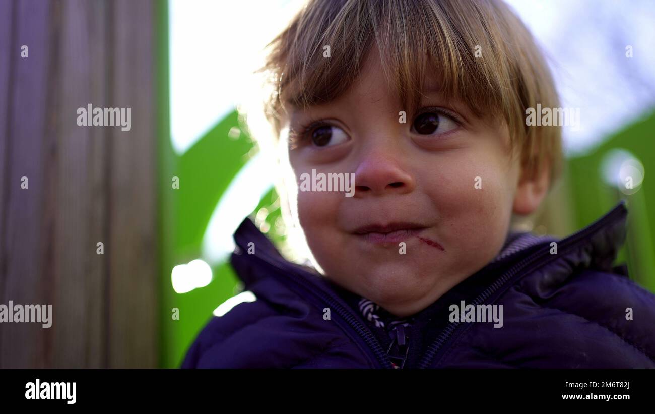 Cute little baby toddler child portrait in sunlight outside Stock Photo ...
