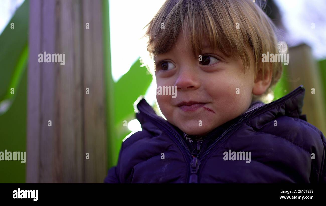 Cute little baby toddler child portrait in sunlight outside Stock Photo ...