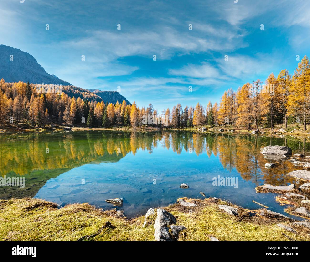 Autumn alpine mountain lake near San Pellegrino Pass, Trentino ...