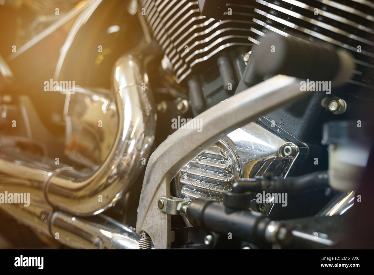 Shiny chrome-plated motorcycle engine and gearbox block. Close-up Stock ...