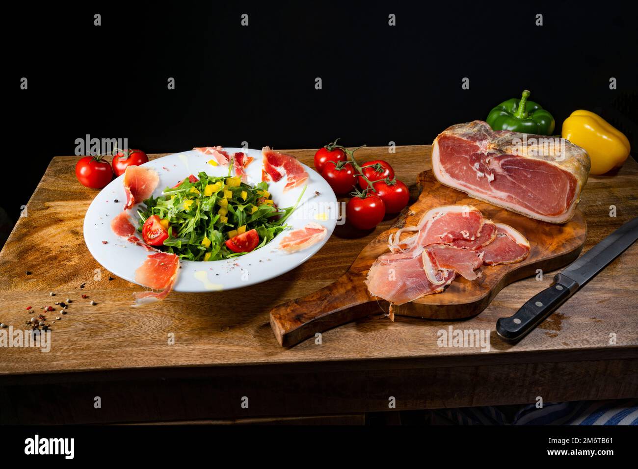 Rocket salad with dried Spanish ham Stock Photo - Alamy