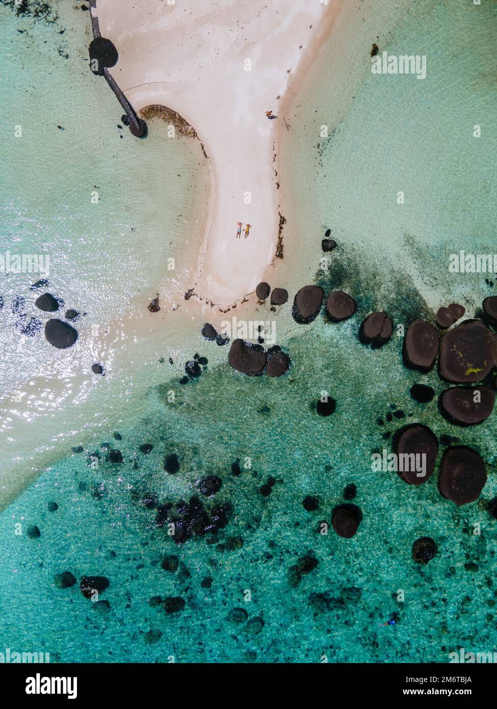 Couple man and women on a tropical island in Thailand, Koh Kham Island ...