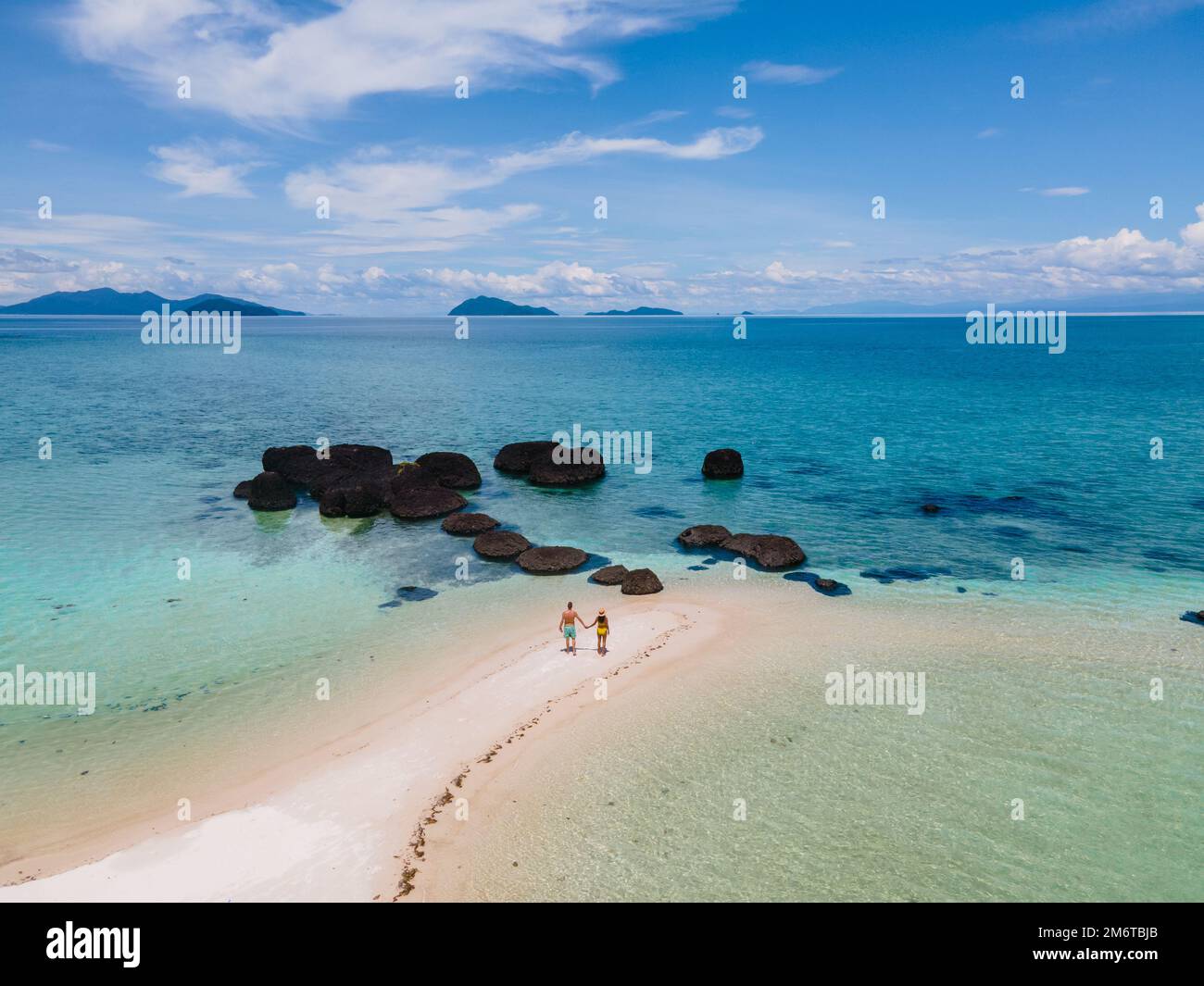 Couple man and women on a tropical island in Thailand, Koh Kham Island ...