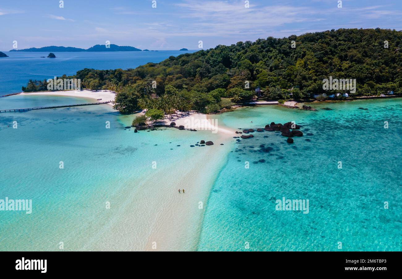 Drone aerial view couple men and women on a tropical beach in Thailand ...