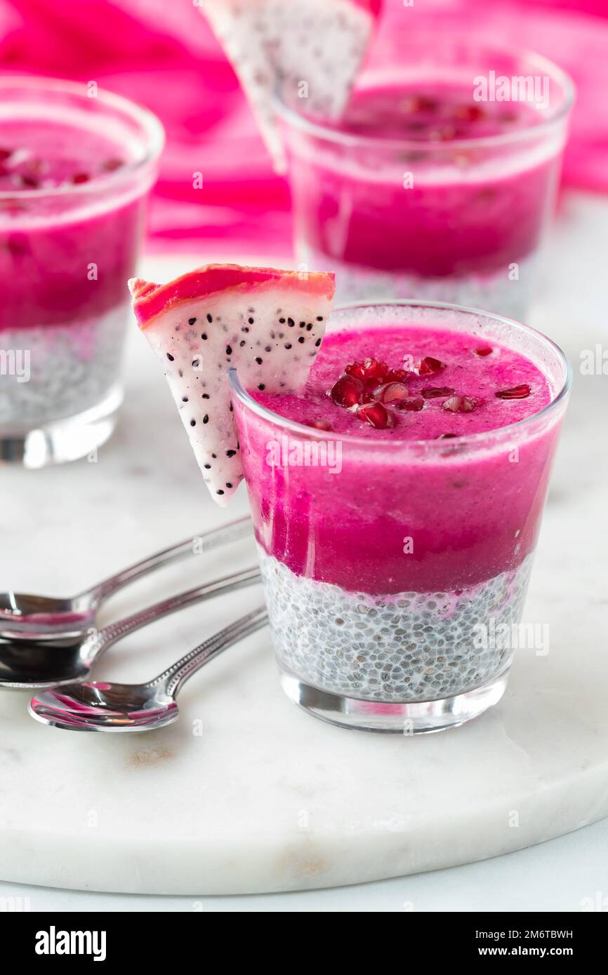 Dragon fruit chia pudding parfaits topped with pomegranate arils Stock ...