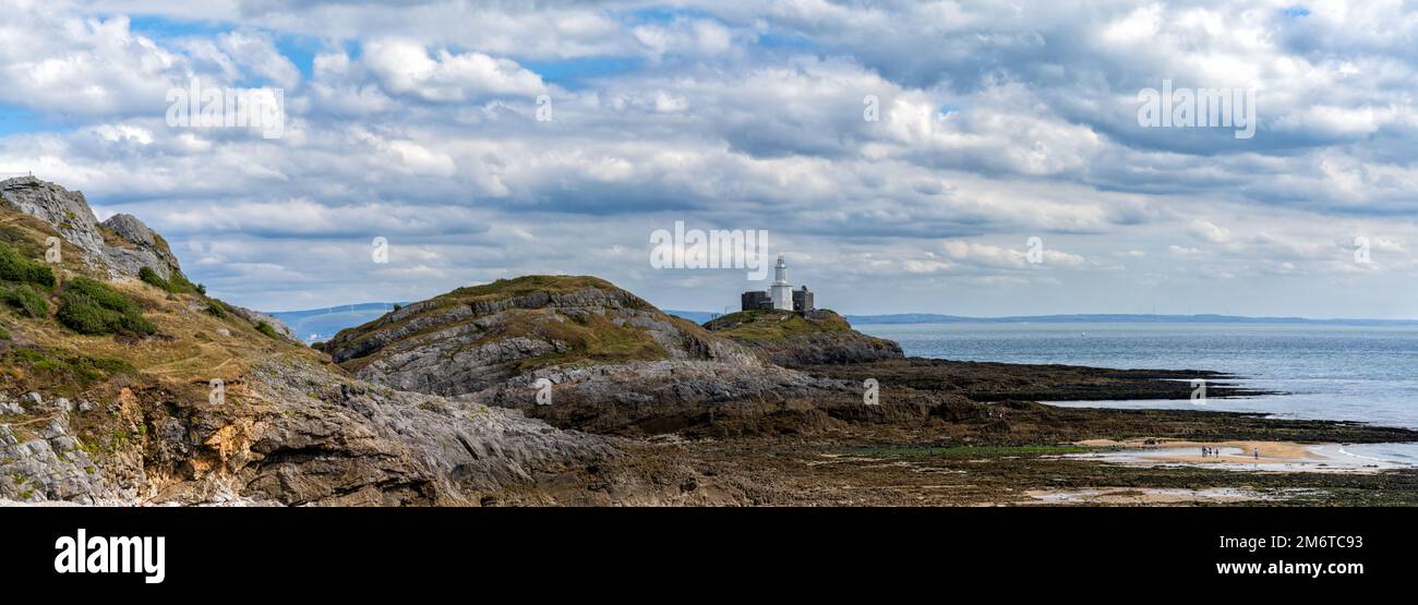 A panorama view of the Mumbles headland with the historic lighthouse in ...