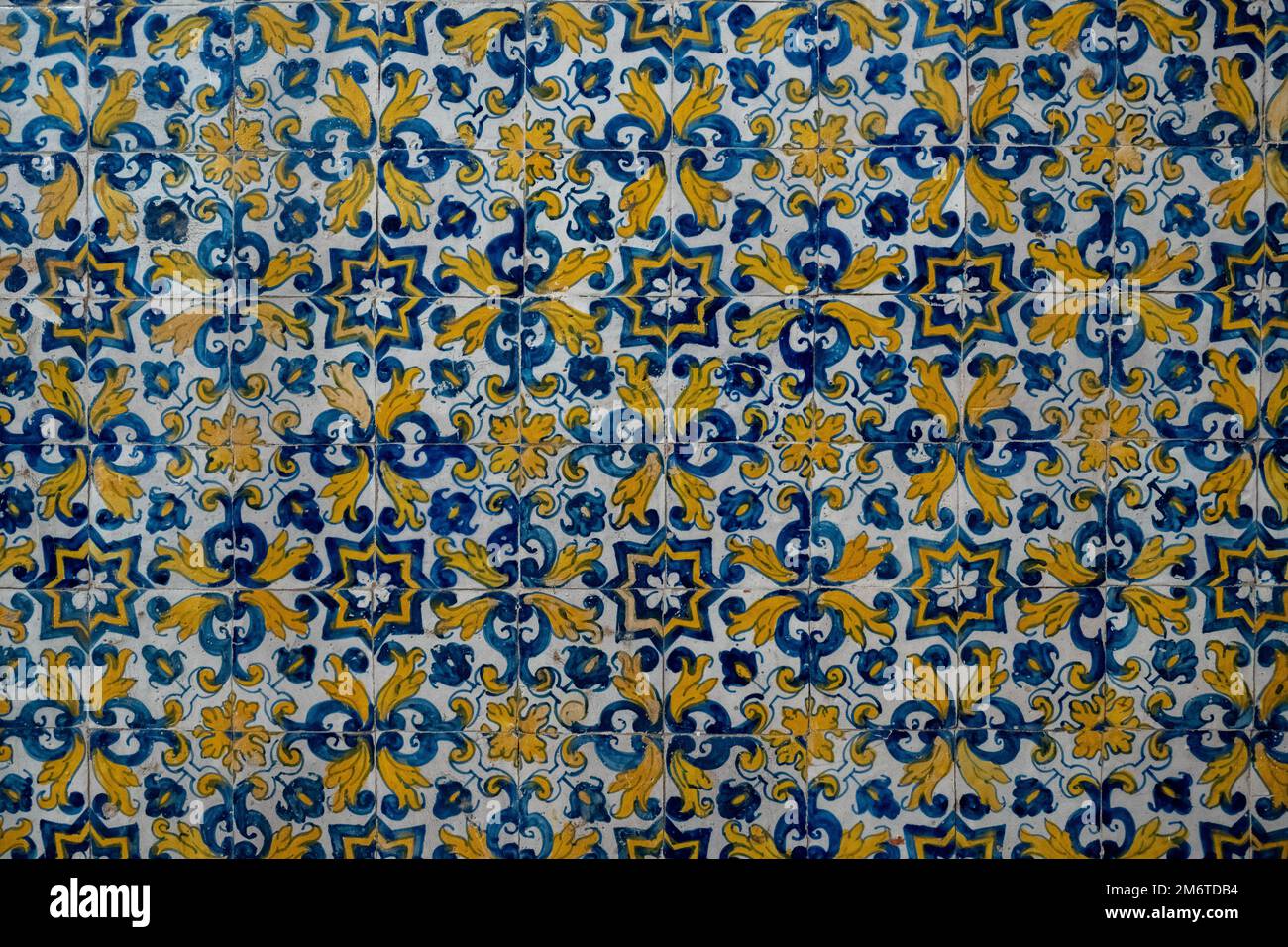 A set of beautiful Portuguese tile with yellow and blue ornate patterns ...