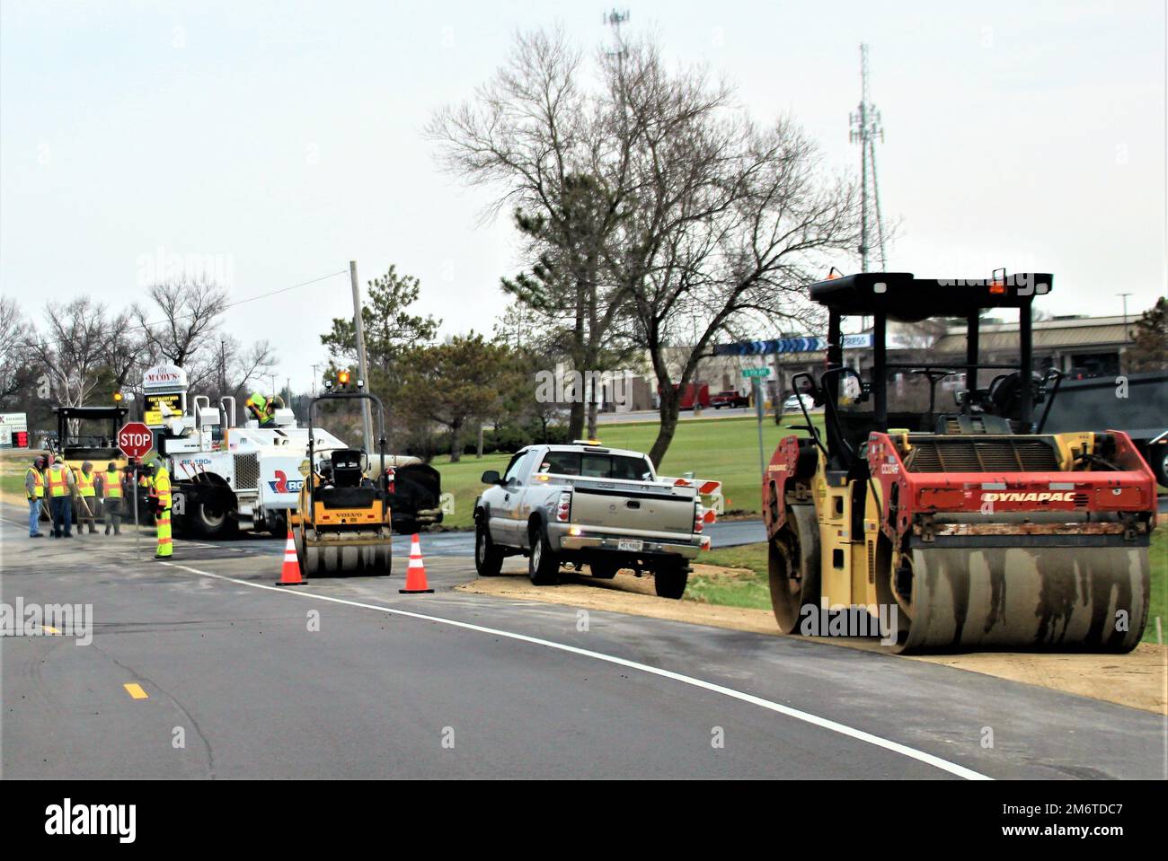 Workers with Mathy Construction of Onalaska, Wis., complete road ...