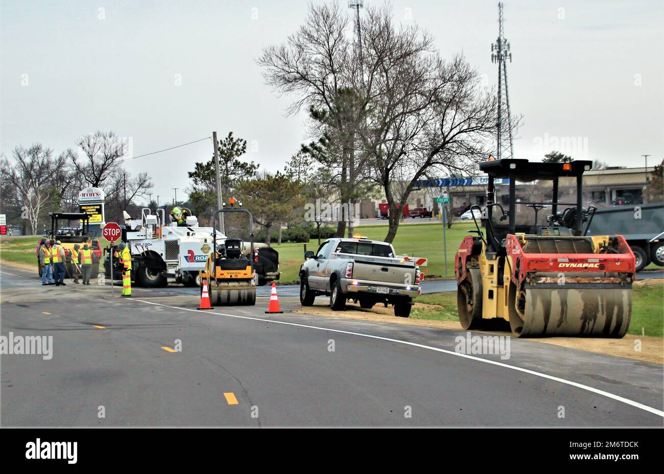 Workers with Mathy Construction of Onalaska, Wis., complete road ...