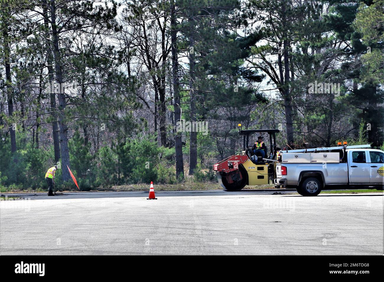 Workers with Mathy Construction of Onalaska, Wis., complete road ...