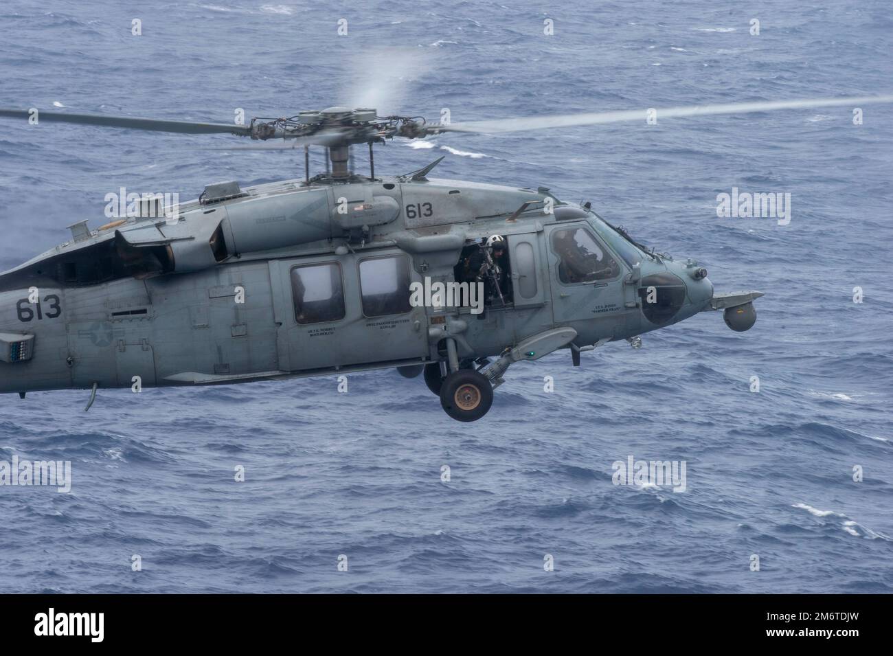 230105-N-KU796-1205 PHILIPPINE SEA (Jan. 5, 2023) An MH-60S Sea Hawk ...