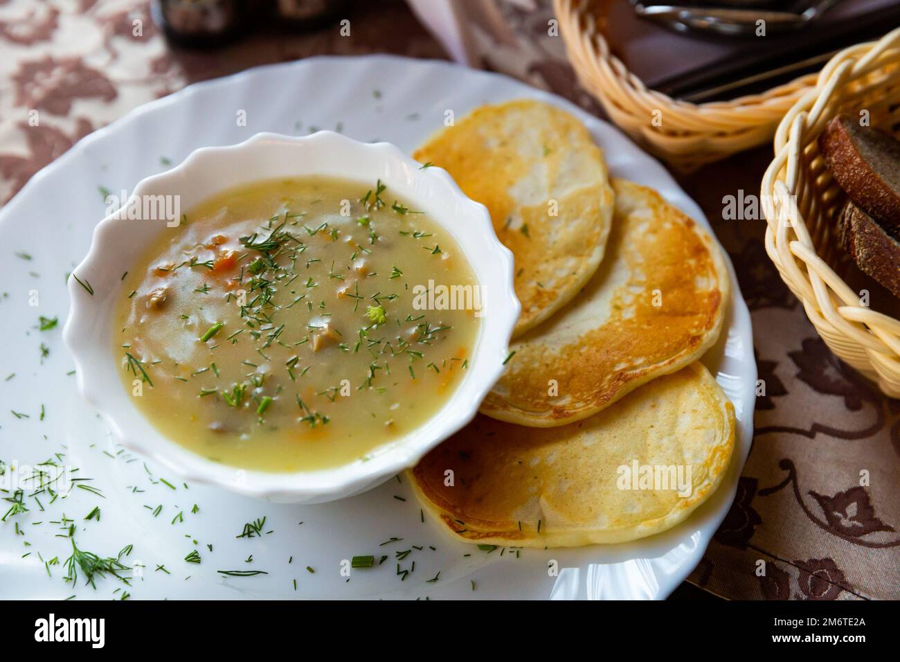 Traditional Belarusian machanka with pancakes Stock Photo - Alamy
