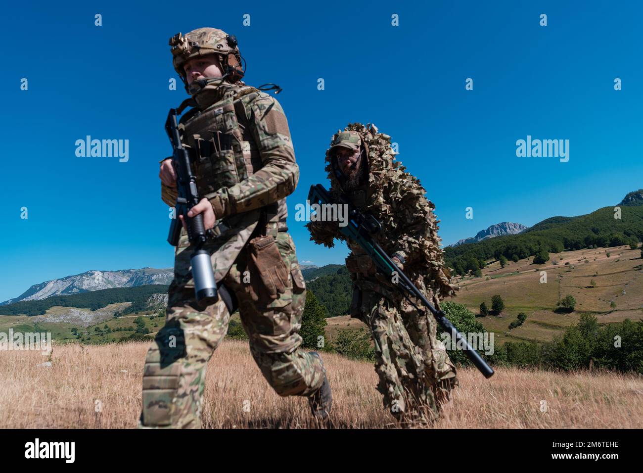 A sniper team squad of soldiers is going undercover. Sniper assistant ...