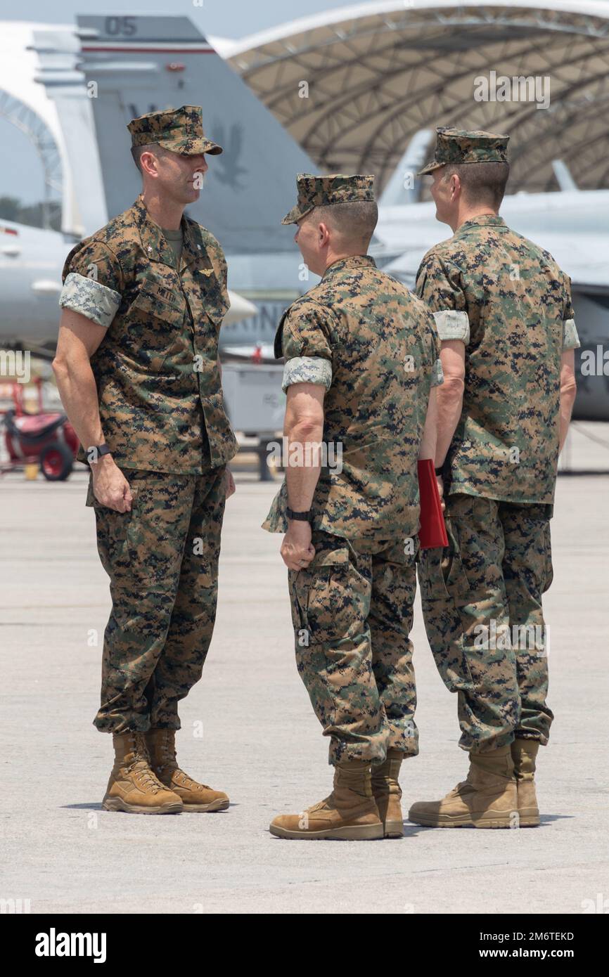 U.S. Marine Corps Lt. Col. Timothy M. Miller, left, outgoing commanding ...