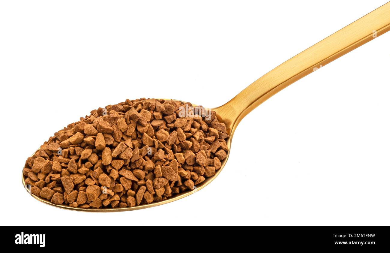 Instant coffee in gold spoon isolated on white background Stock Photo ...