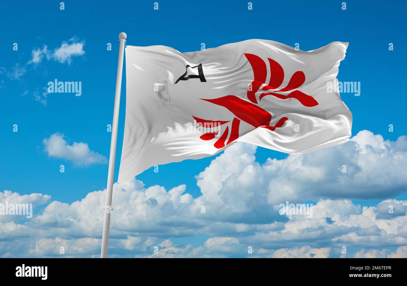 official flag of Anmore, British Columbia Canada at cloudy sky ...