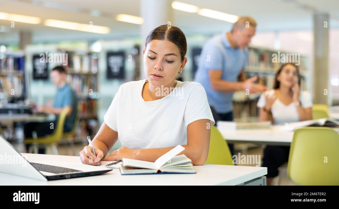 Smart female American student preparing for the exam Stock Photo - Alamy