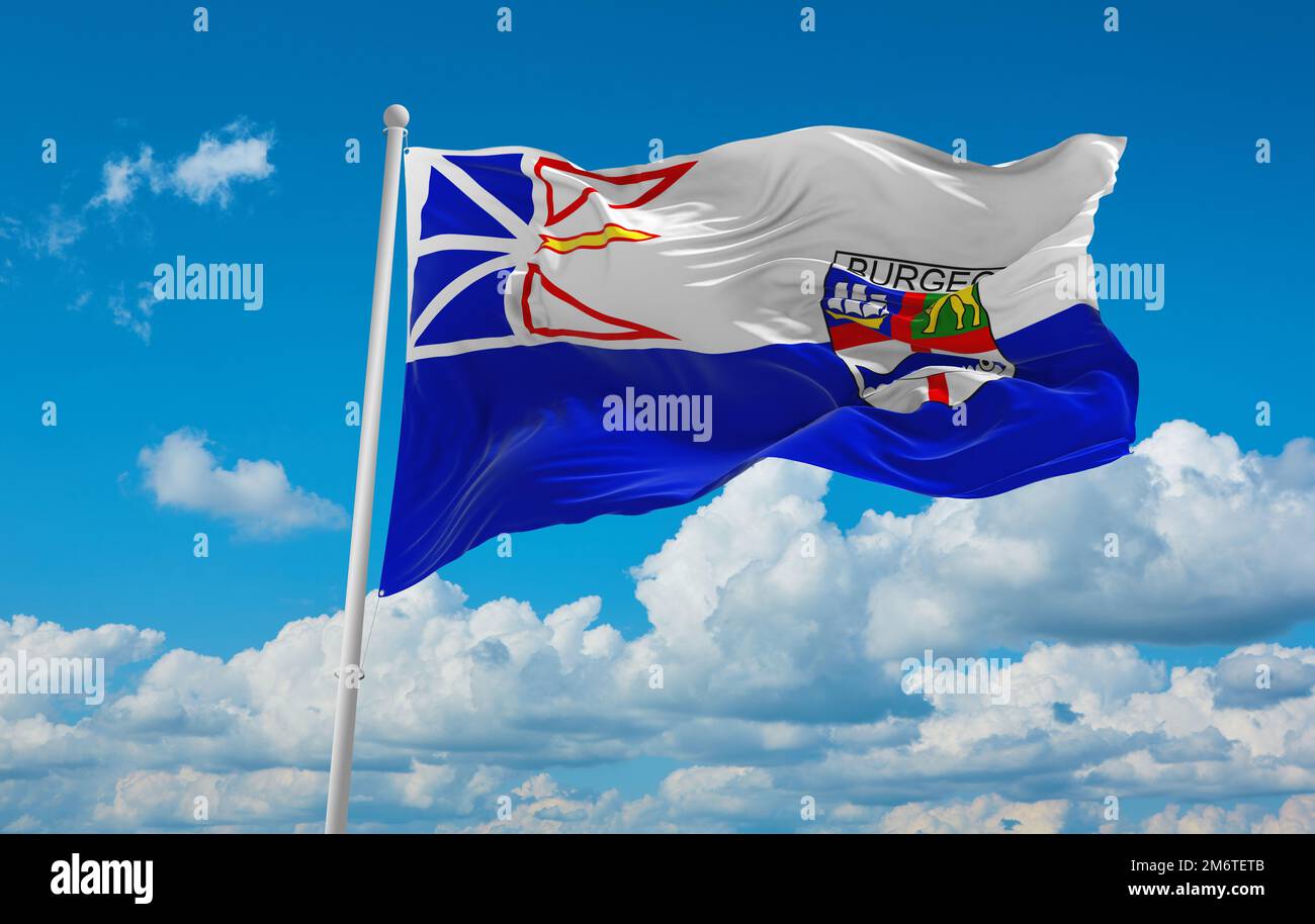 official flag of Burgeo Canada at cloudy sky background on sunset ...