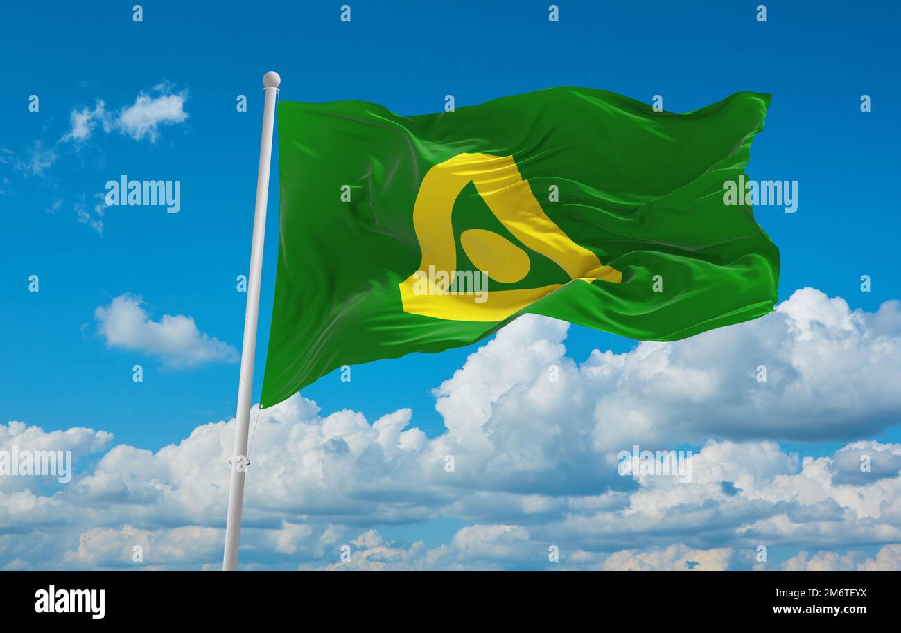 official flag of Delta, British Columbia Canada at cloudy sky ...