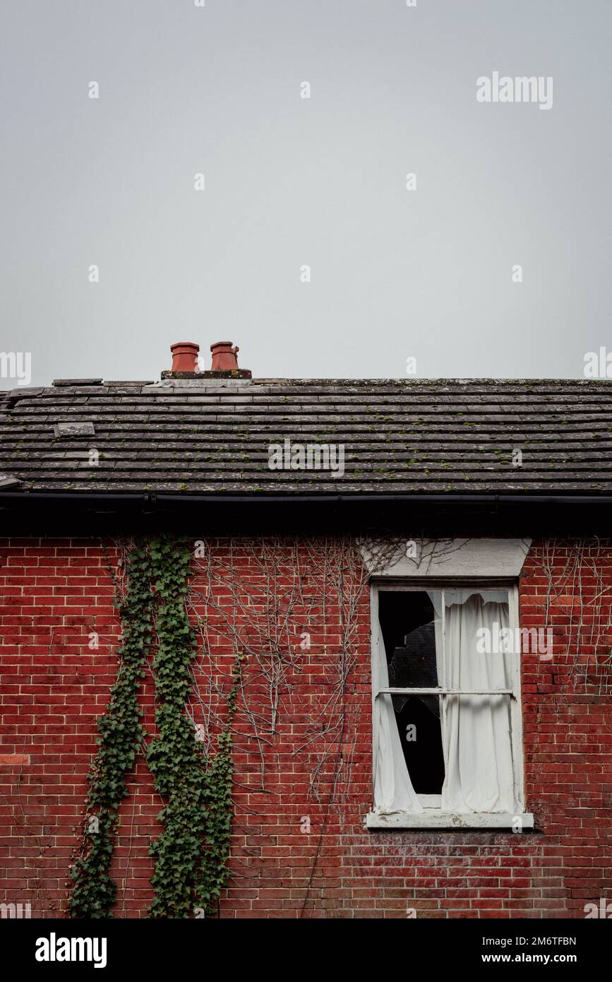 Broken window in an abandoned house, England, UK Stock Photo - Alamy