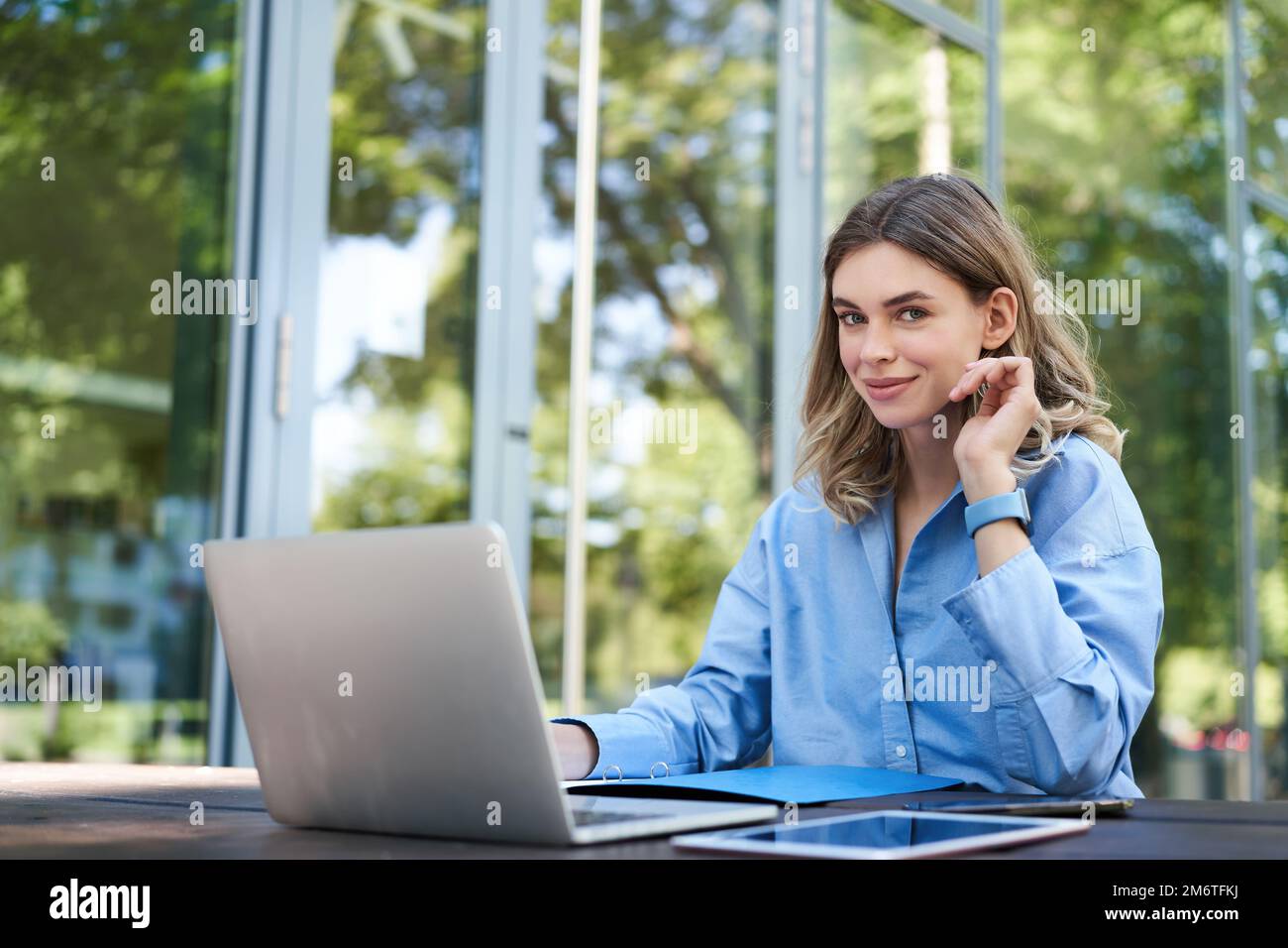 Portrait of business woman working on fresh air. Corporate female with ...
