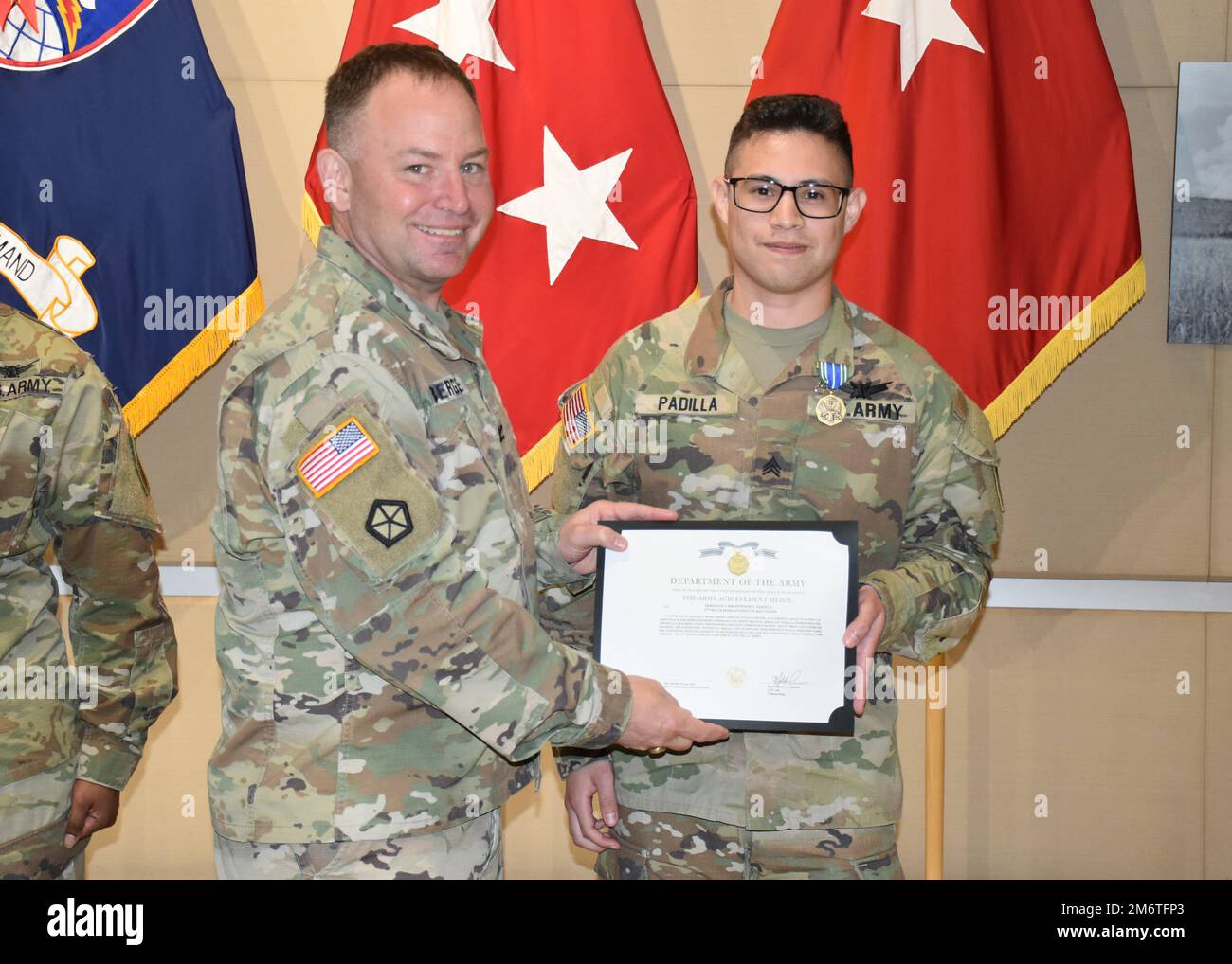 Sgt. Christopher Padilla receives the Army Achievement Medal from Col ...