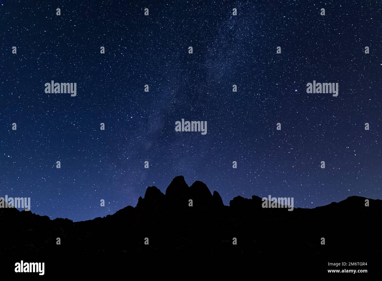 Clear desert sky above the needles of the Organ Mountains-Desert Peaks ...