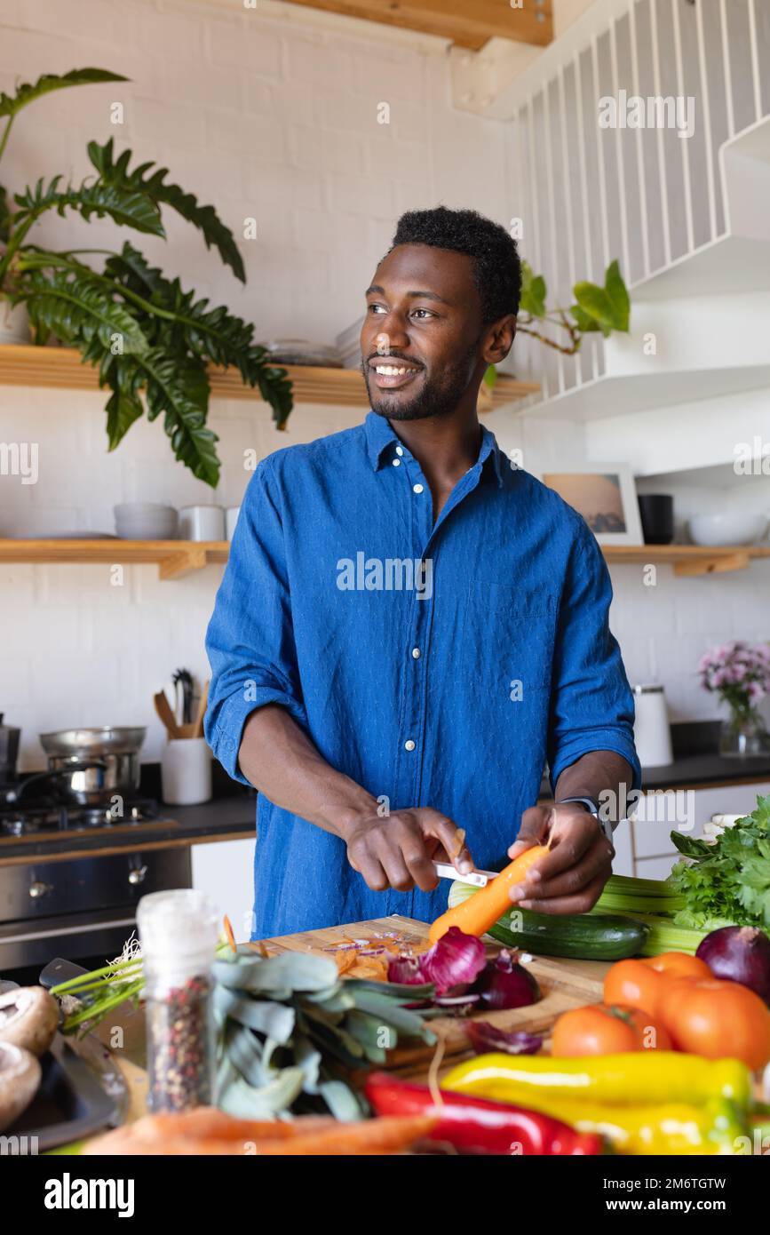 African man cooking meat hi-res stock photography and images - Alamy