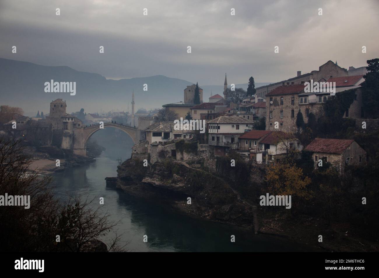 A high-angle of Mostar old bridge on a gloomy day Stock Photo - Alamy