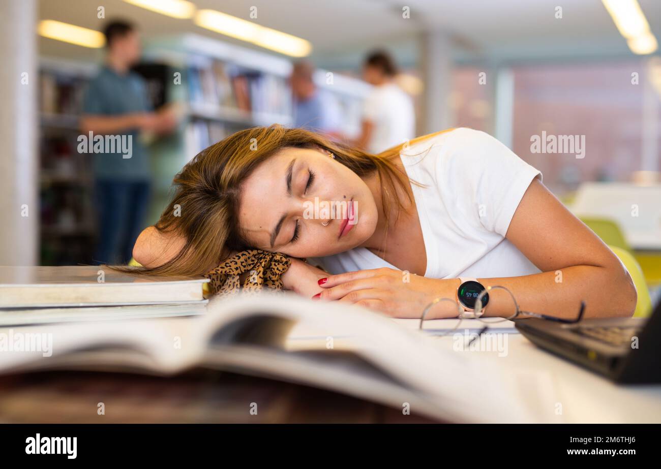 Woman fell asleep table hi-res stock photography and images - Alamy