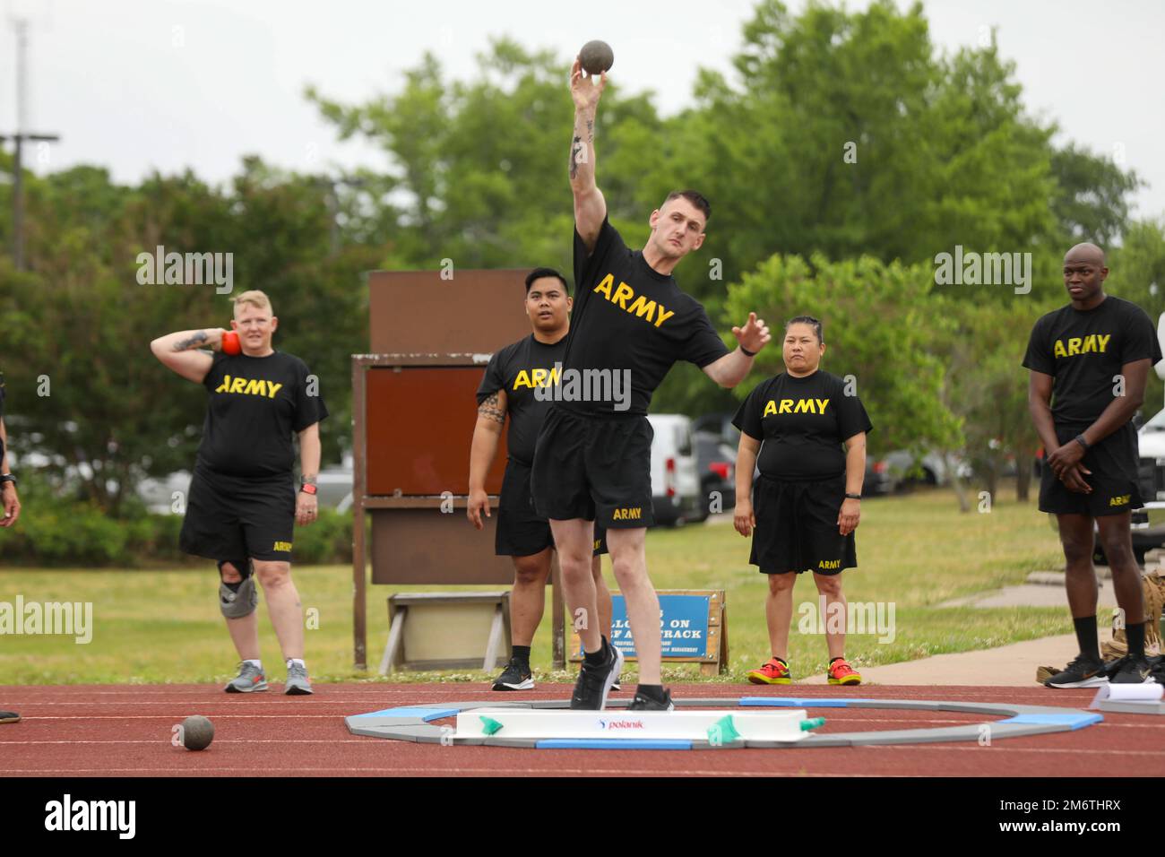 U.S. Army Spc. Justin Anderson puts a shot in the Field event during ...