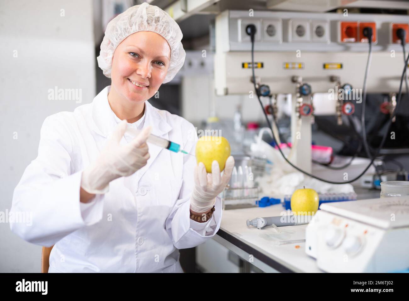 Inspecting woman technician in hi-res stock photography and images - Alamy