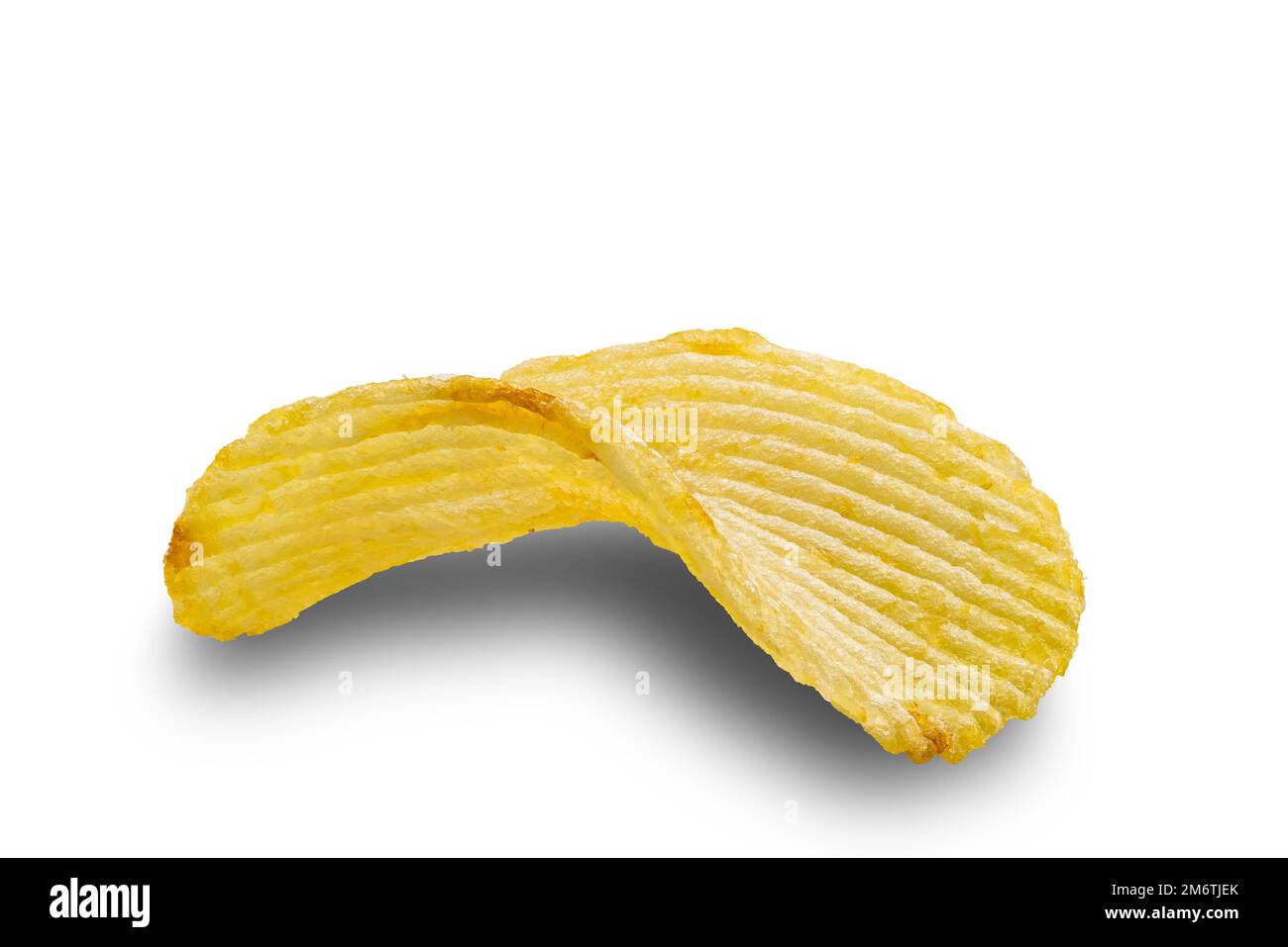 Closeup view of single dry crispy salted potato chip isolated on white ...